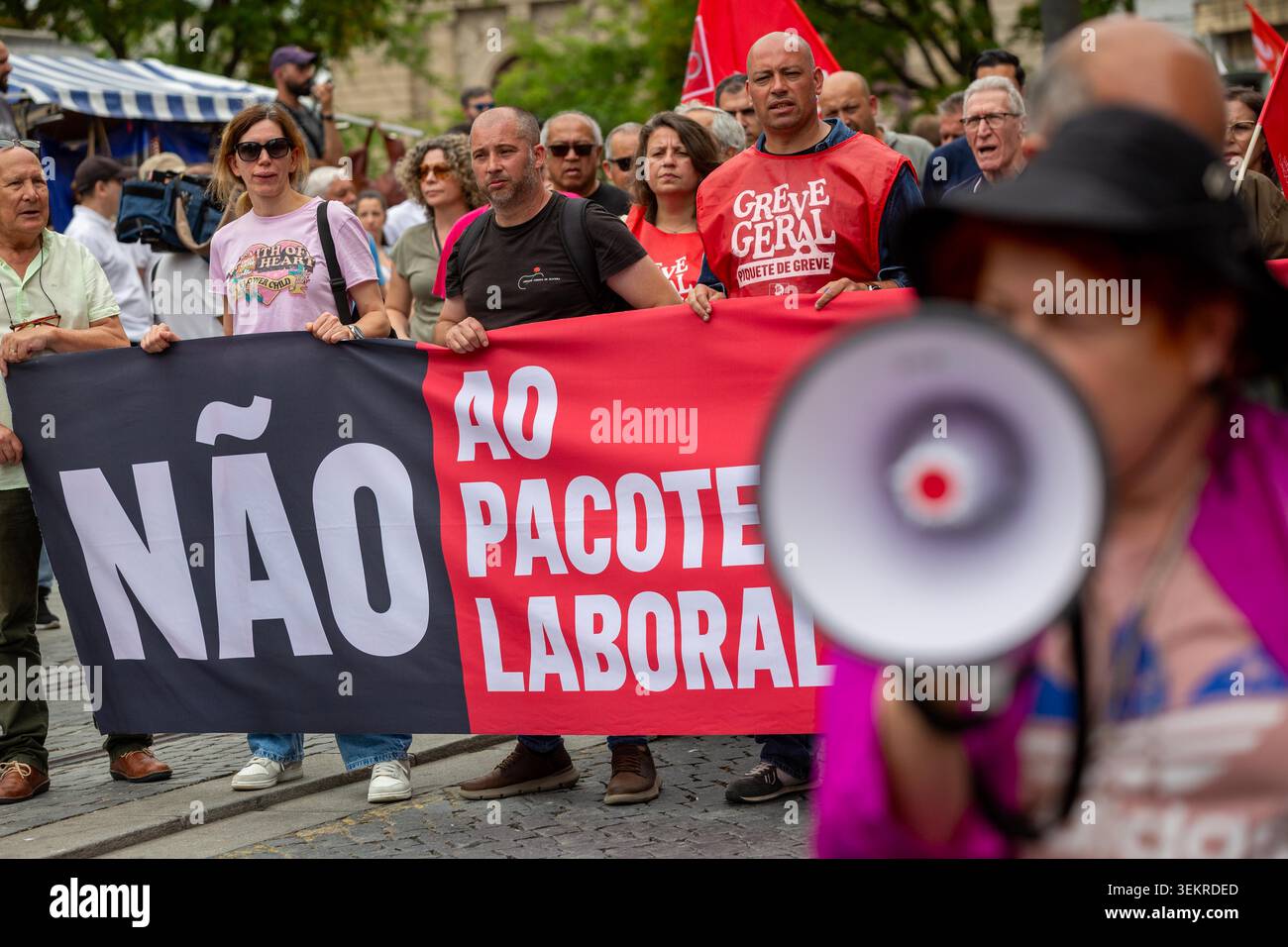 Porto, Portugal, 3 June 2026. Protesters march with banners opposing ...