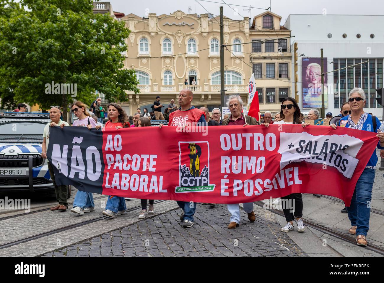 Porto, Portugal, 3 June 2026. Protesters march with banners opposing ...