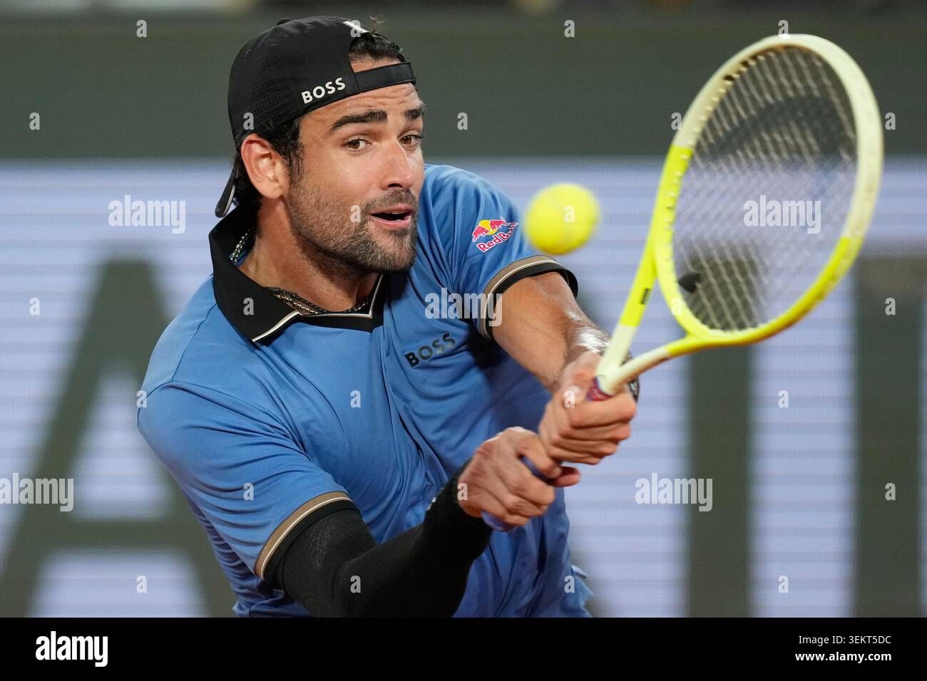 Italy's Matteo Berrettini returns to Italy's Matteo Arnaldi during the ...