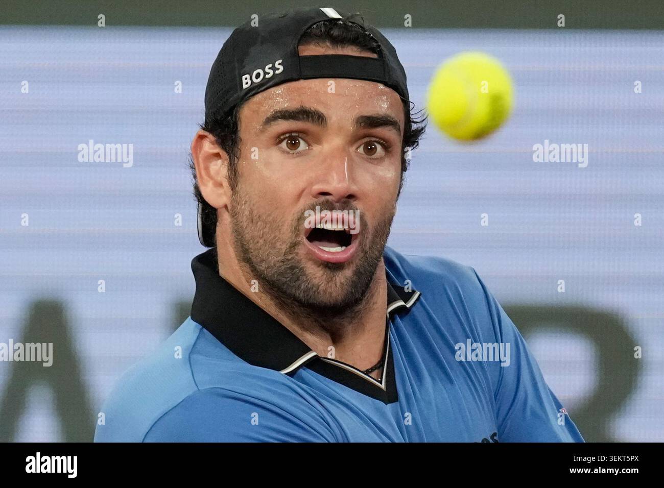 Italy's Matteo Berrettini returns to Italy's Matteo Arnaldi during the ...