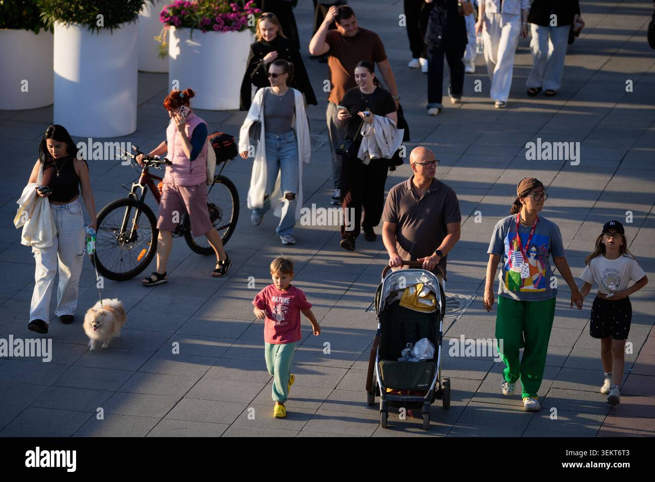 People enjoy a warm weather at Gorky park in Moscow, Wednesday, June 3 ...