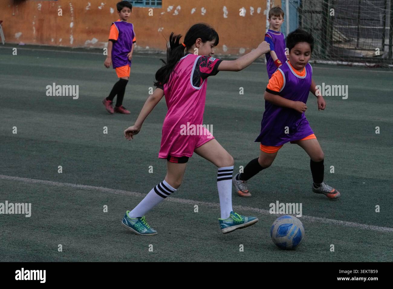 Children play in a soccer class in Tehran, Iran, Wednesday, June 3 ...