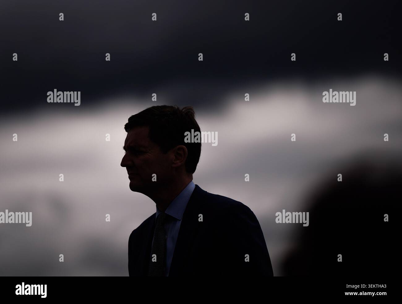 B.C. Premier David Eby is silhouetted during an announcement about ...