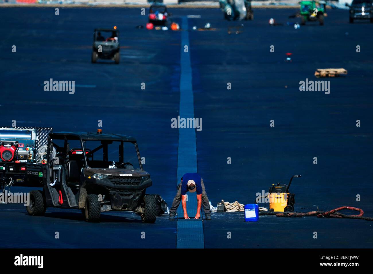 A worker places a grate in the center of the Lincoln Memorial ...