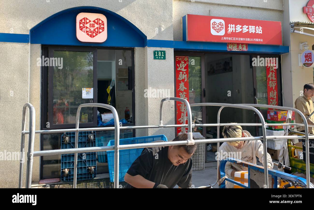 SHANGHAI, CHINA - JUNE 2, 2026 - A courier sorting packages at ...