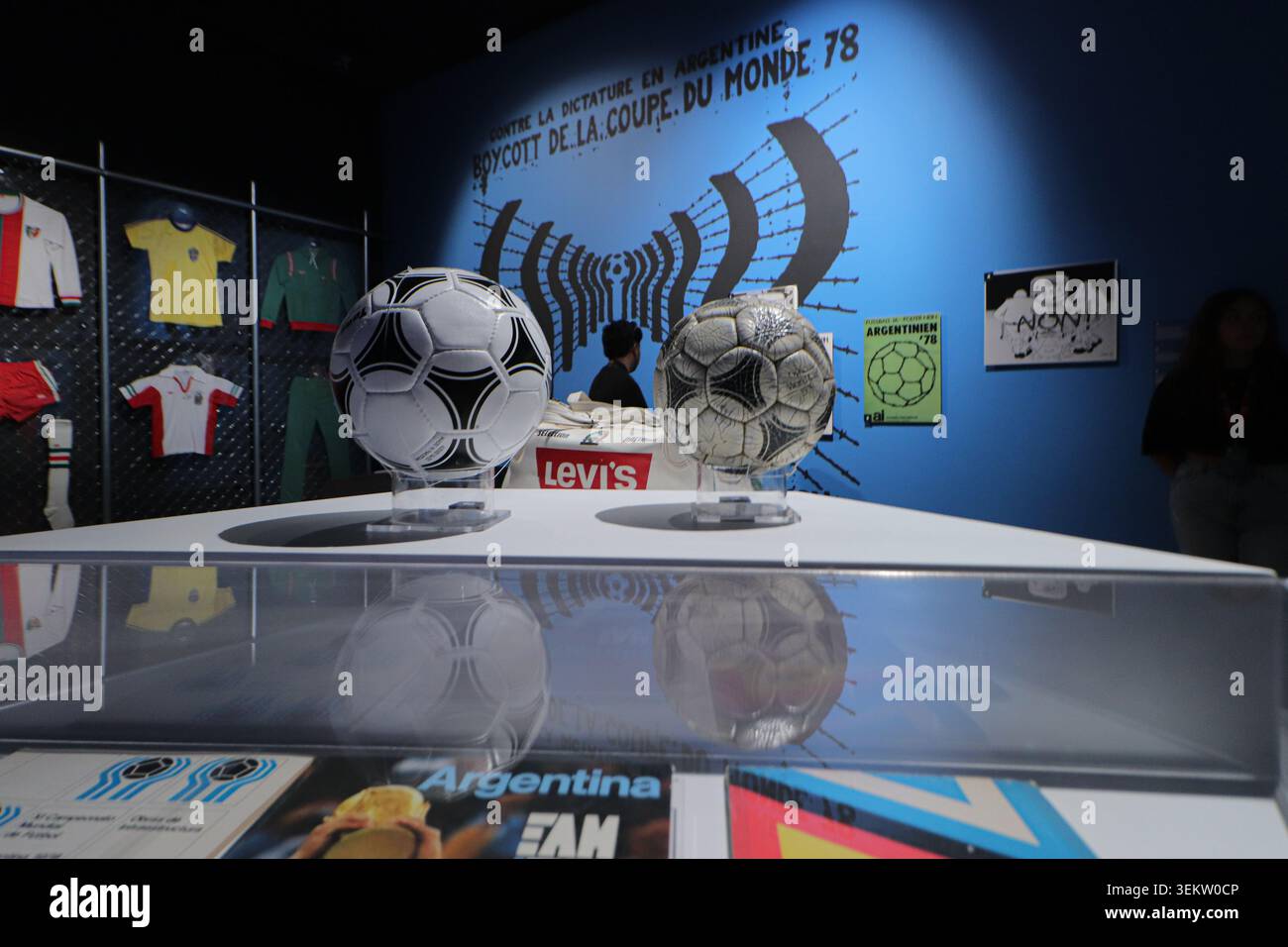 Soccer items are seen during the exhibition "Soccer: Designing a ...