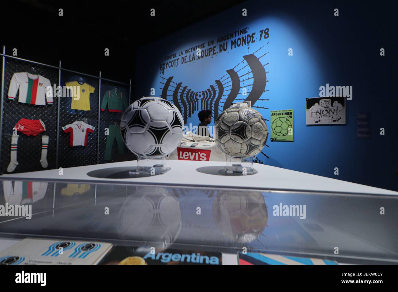 Soccer items are seen during the exhibition "Soccer: Designing a ...