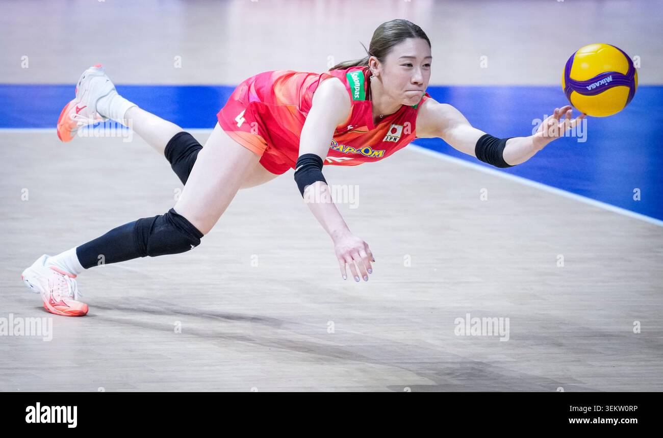 Team Japan Mayu Ishikawa of Japan returns a shot against Team France ...