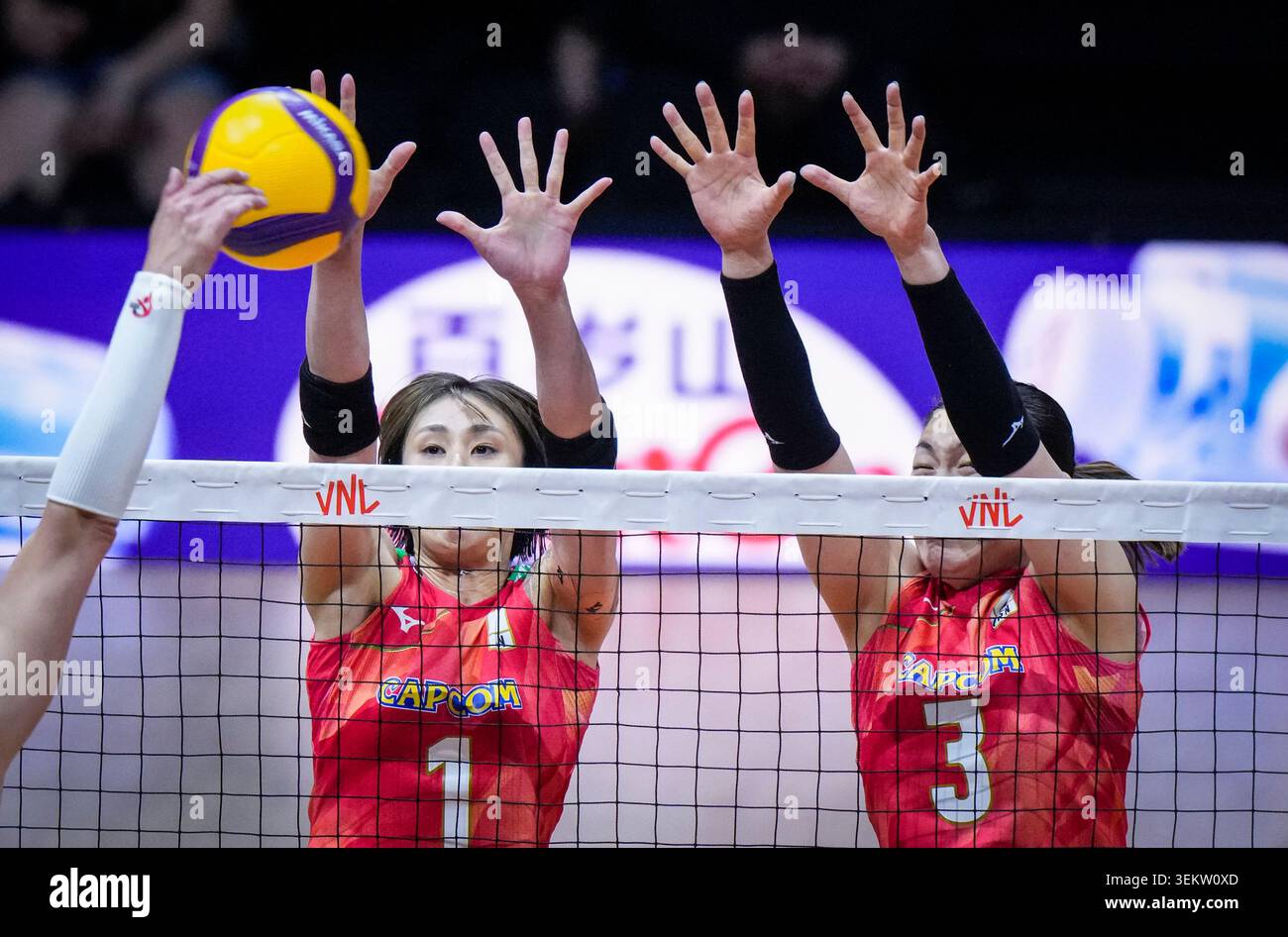 Team Japan Yukiko Wada and Haruyo Shimamura jump to block a shot ...