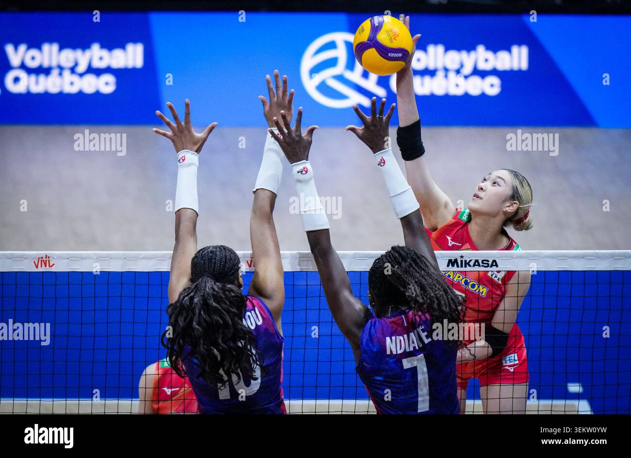 Team Japan Yoshino Sato hits a shot against Team France during their ...