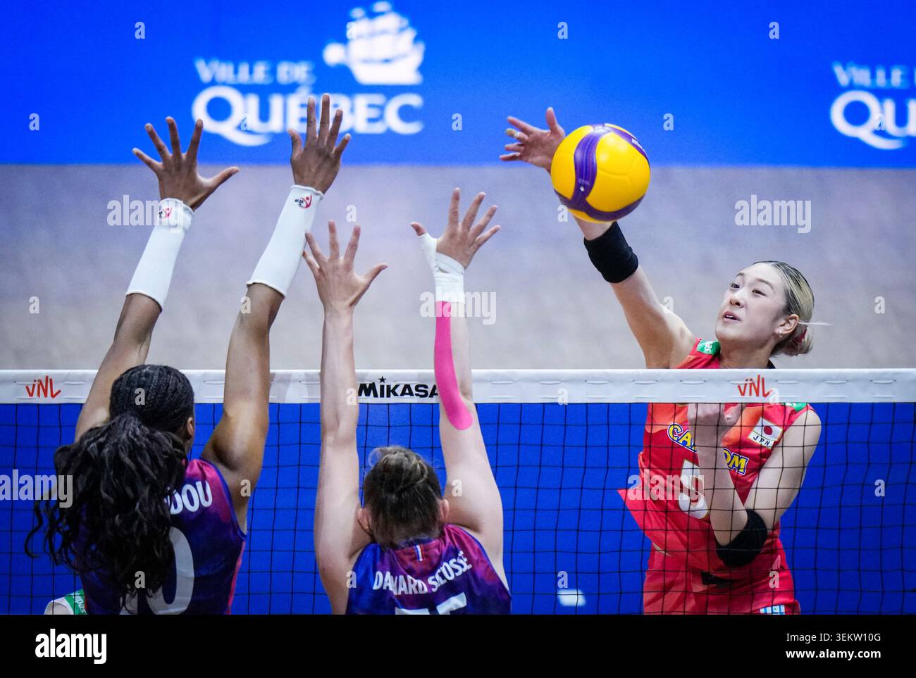 Team Japan Yoshino Sato hits a shot against Team France during their ...