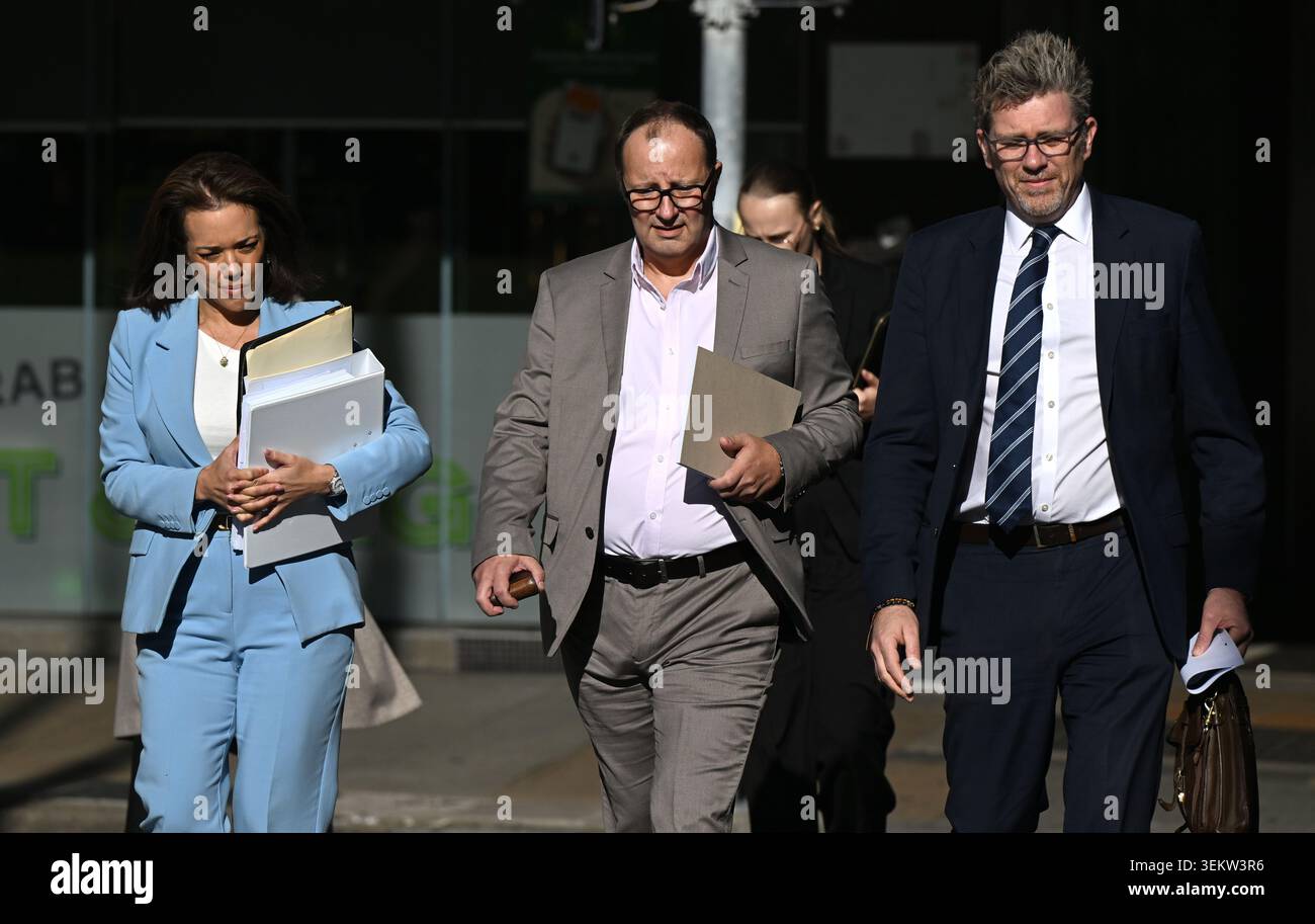 Mark Sheridan Waden (centre) is seen arriving at the Brisbane Supreme ...