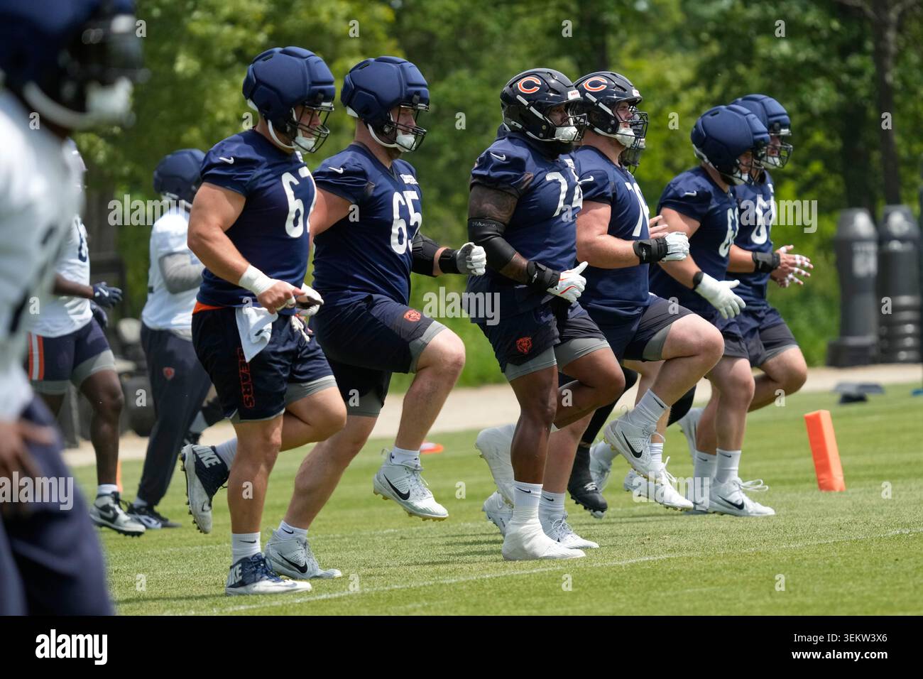 Chicago Bears players work on the field during the NFL football team's ...