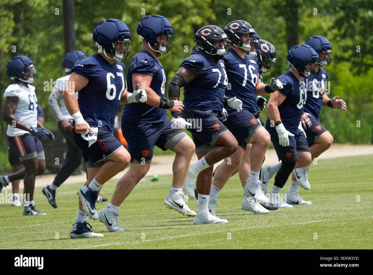 Chicago Bears players work on the field during the NFL football team's ...