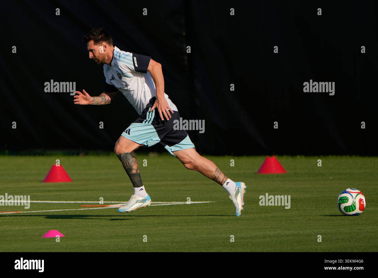 Argentina forward Lionel Messi works out during practice for the FIFA ...