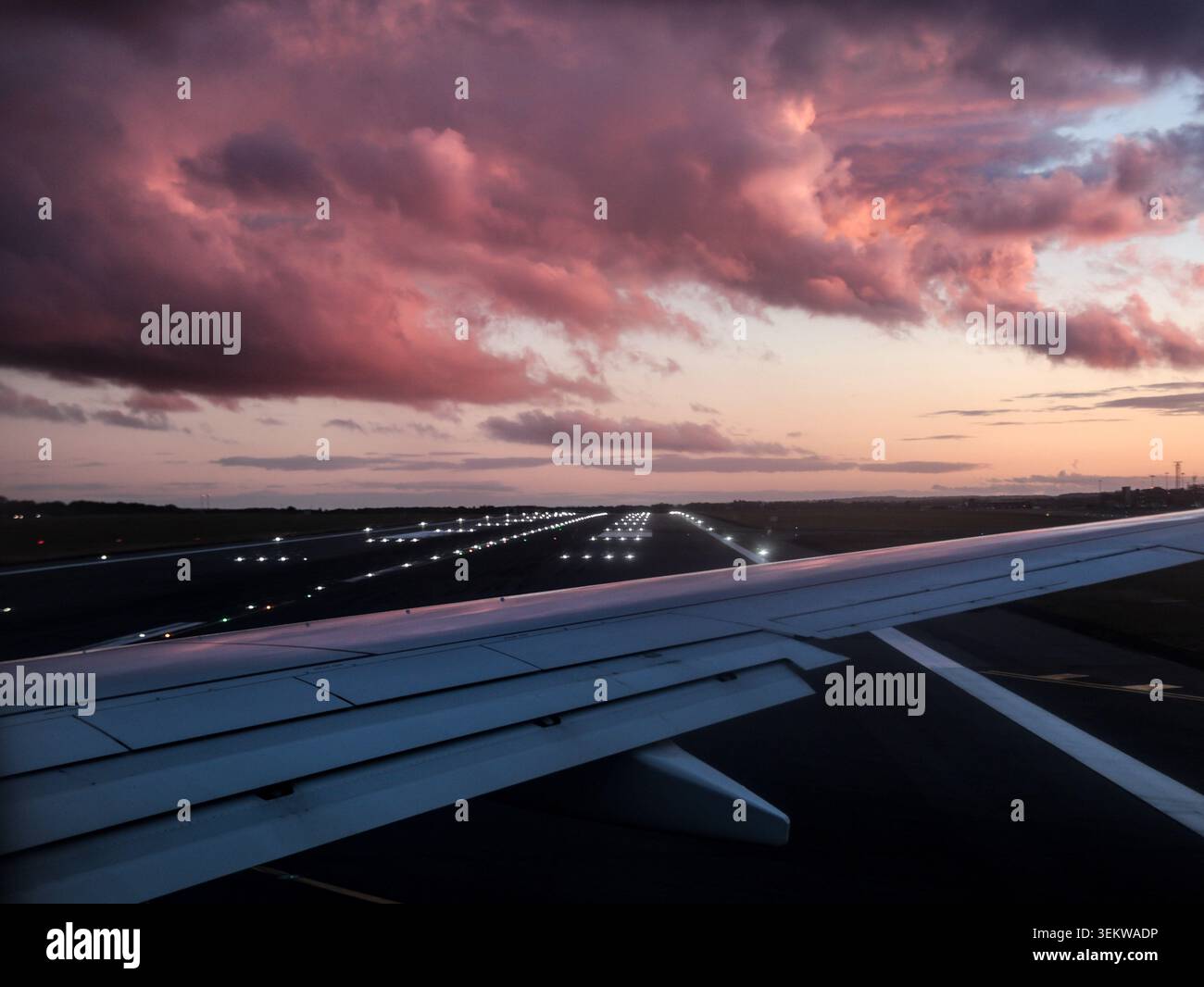 Runway is seen during sunset at London Luton Airport Stock Photo - Alamy