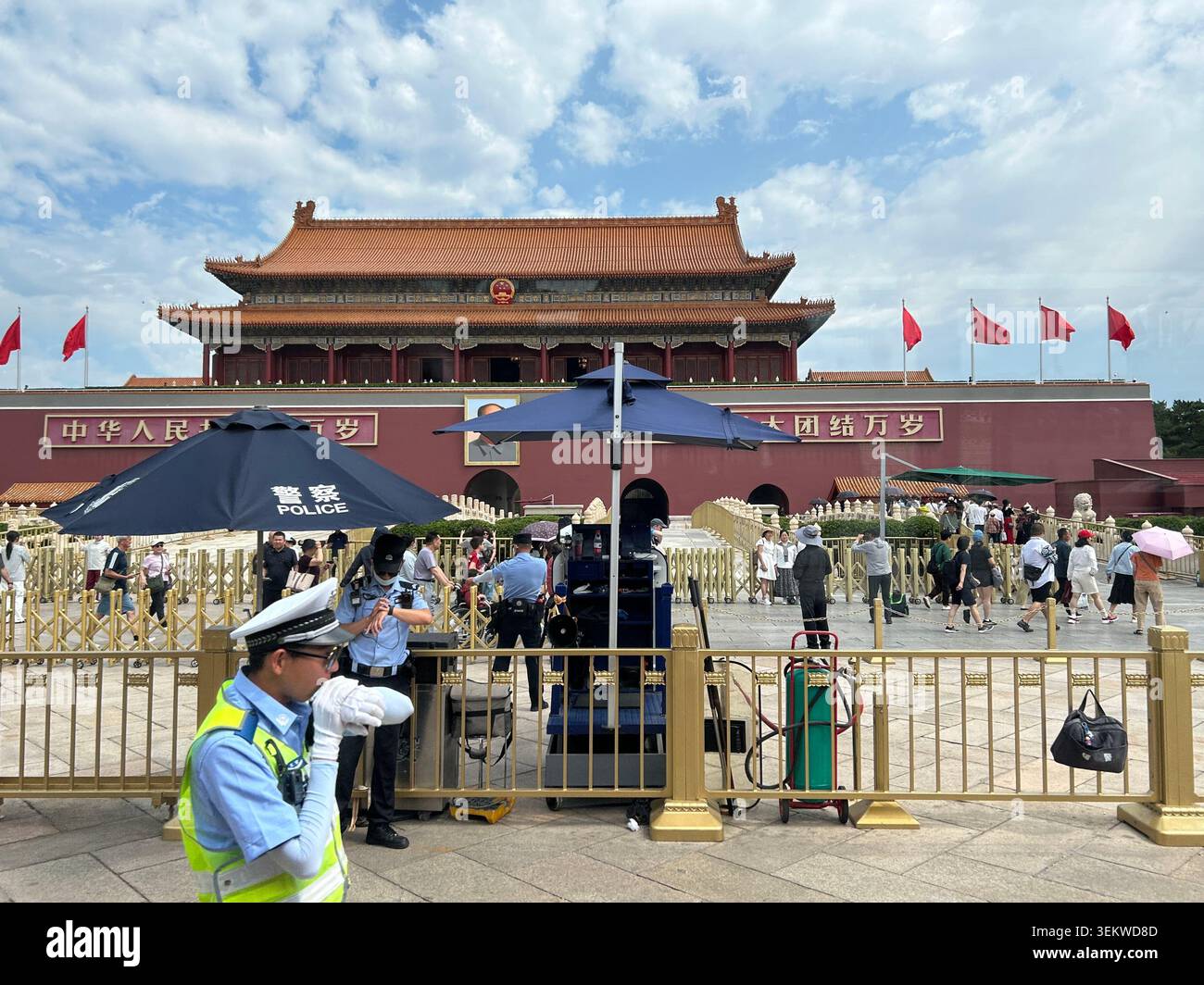 04 June 2026, China, Peking: Police stand in front of the Gate of ...