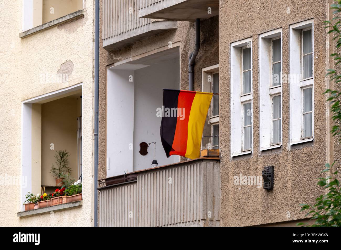 03 June 2026, Berlin: A German flag flies on a balcony in Berlin ...
