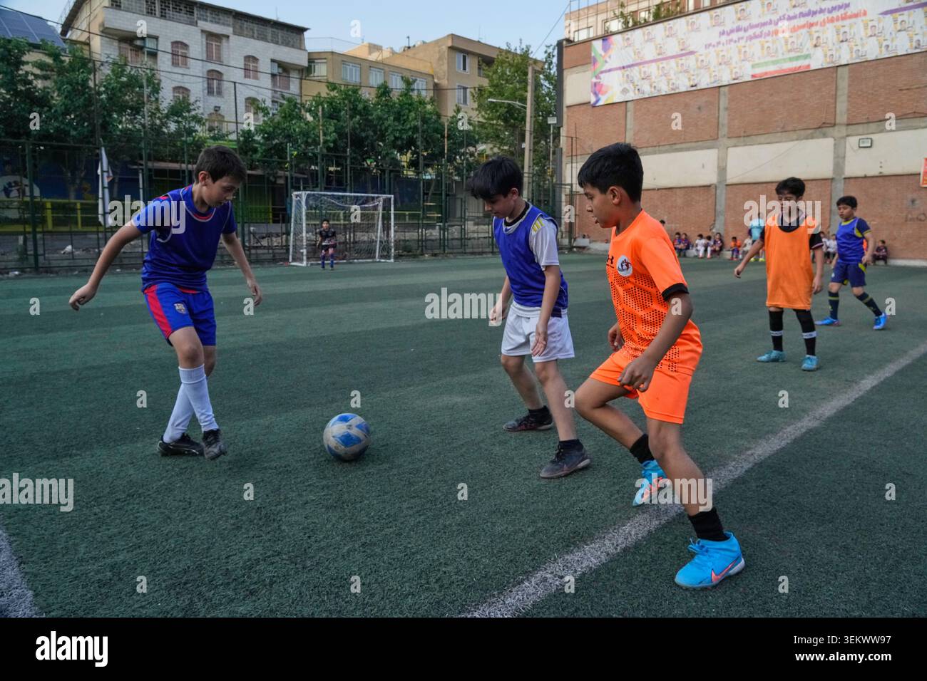 Children train in a soccer class in Tehran, Iran, Wednesday, June 3 ...
