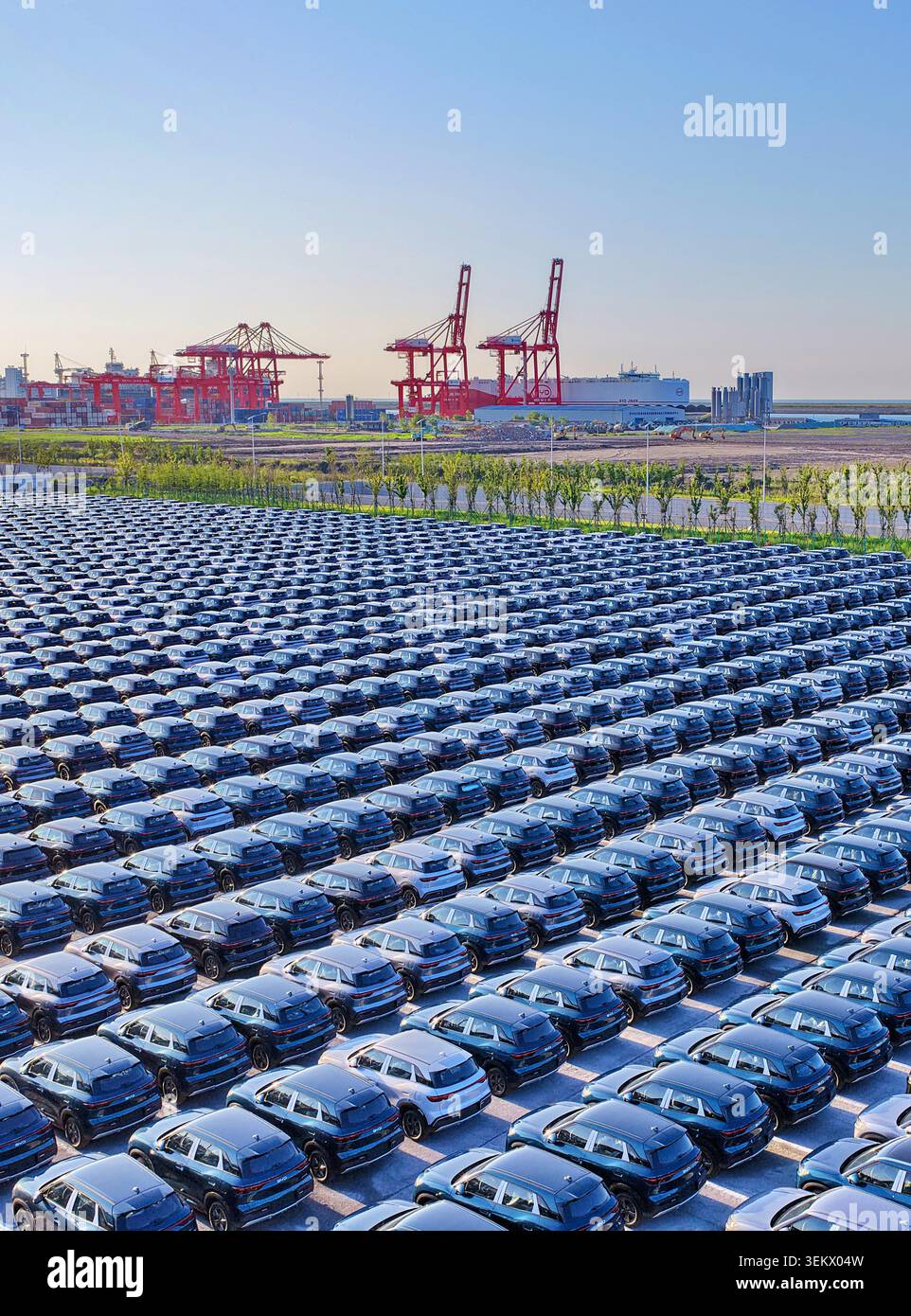 New energy vehicles await loading at Yanglu Railway Lvsi Port Logistics ...