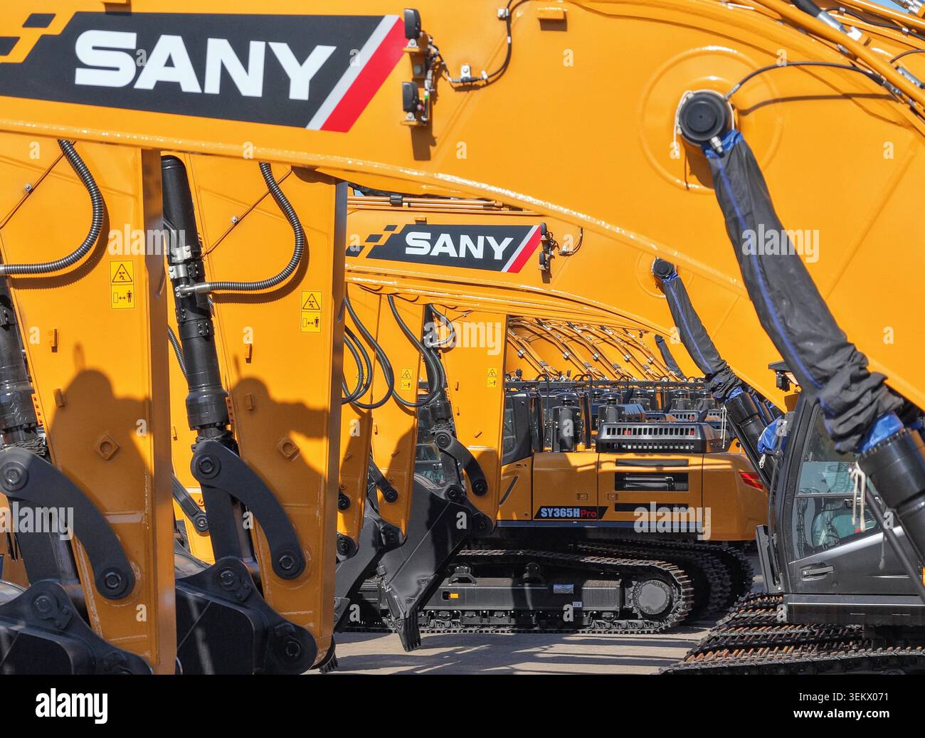 Excavators from Sany Group await export at a storage yard in Yantai ...