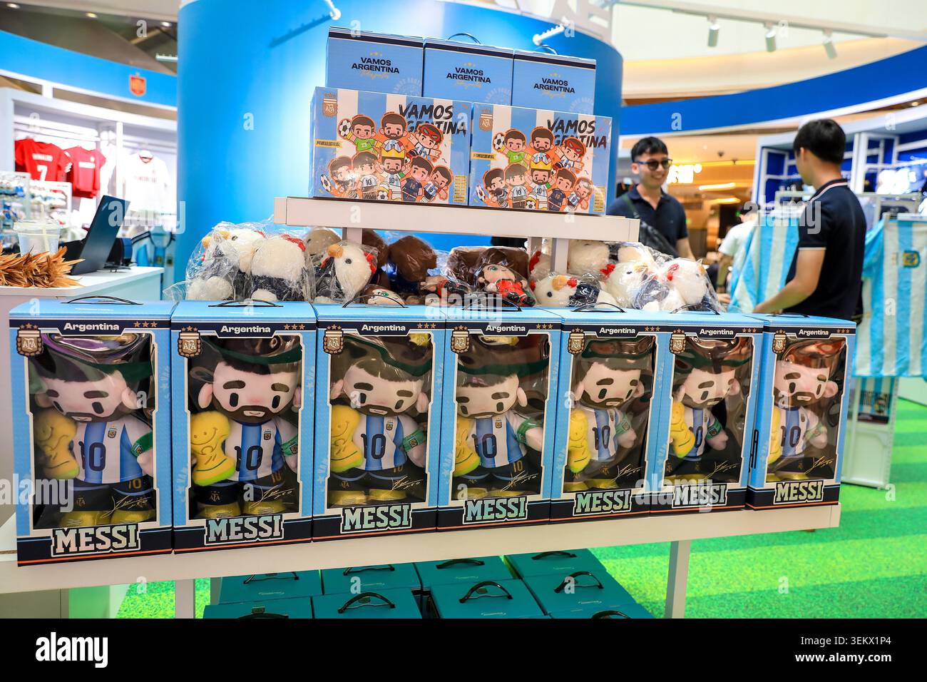 A stall sells official merchandise of World Cup teams including ...