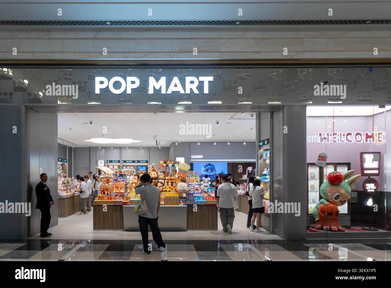 Customers browse blind box toys at a POP MART store in The Londoner ...