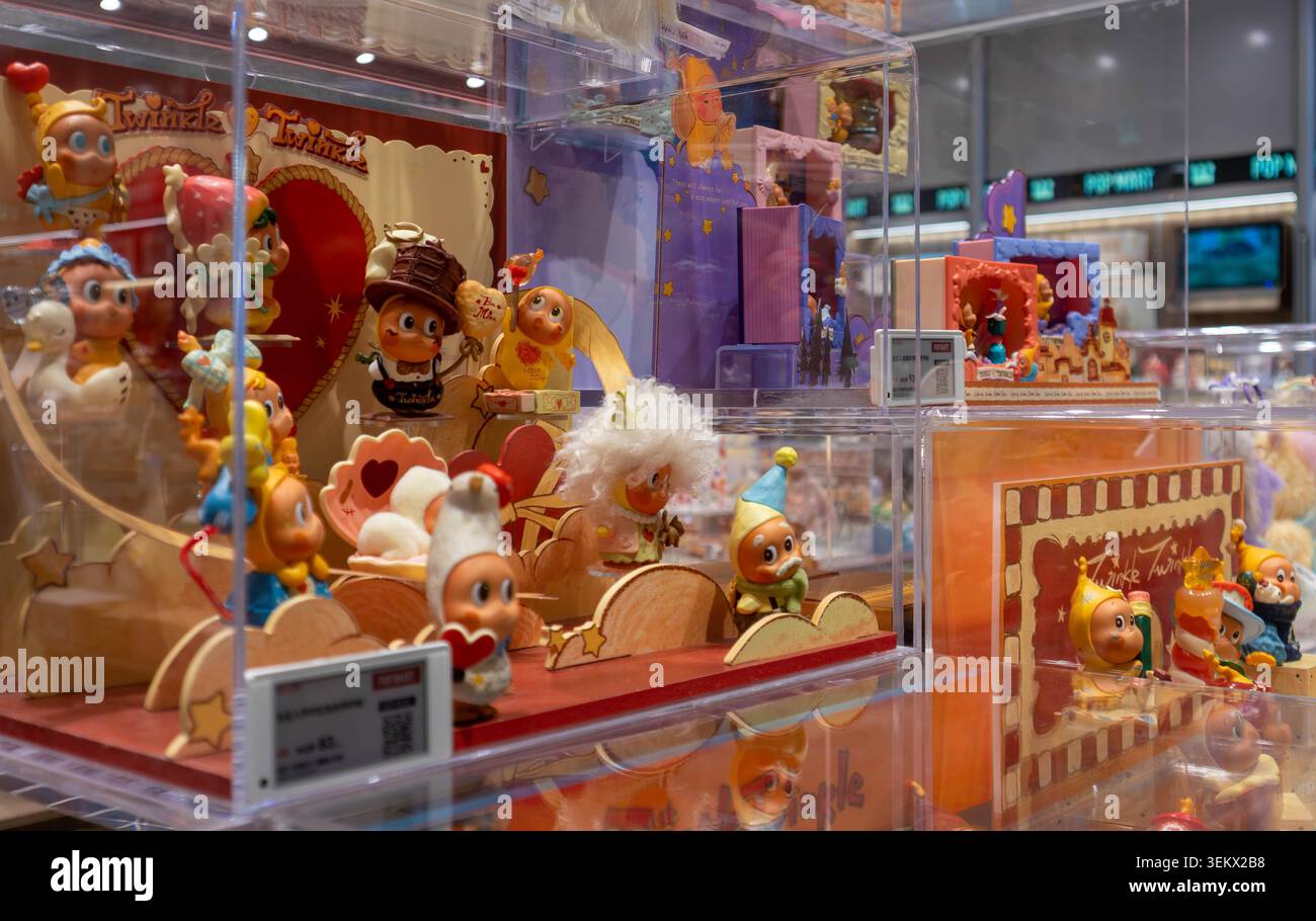 Customers browse blind box toys at a POP MART store in The Londoner ...