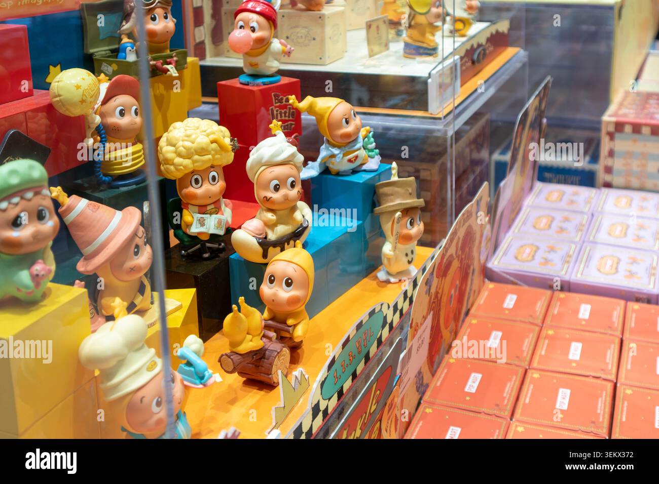 Customers browse blind box toys at a POP MART store in The Londoner ...