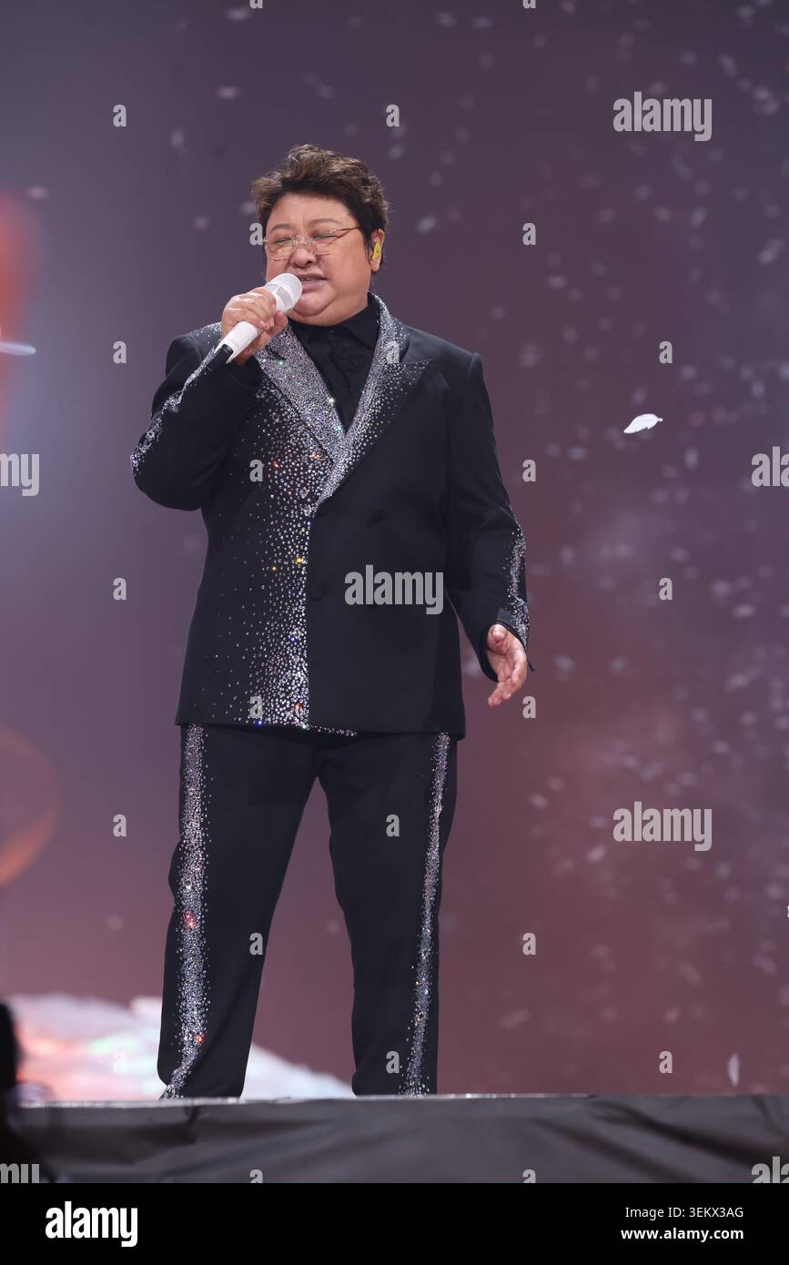 Chinese singer Han Hong attends the PEACEBIRD 30th anniversary fashion ...