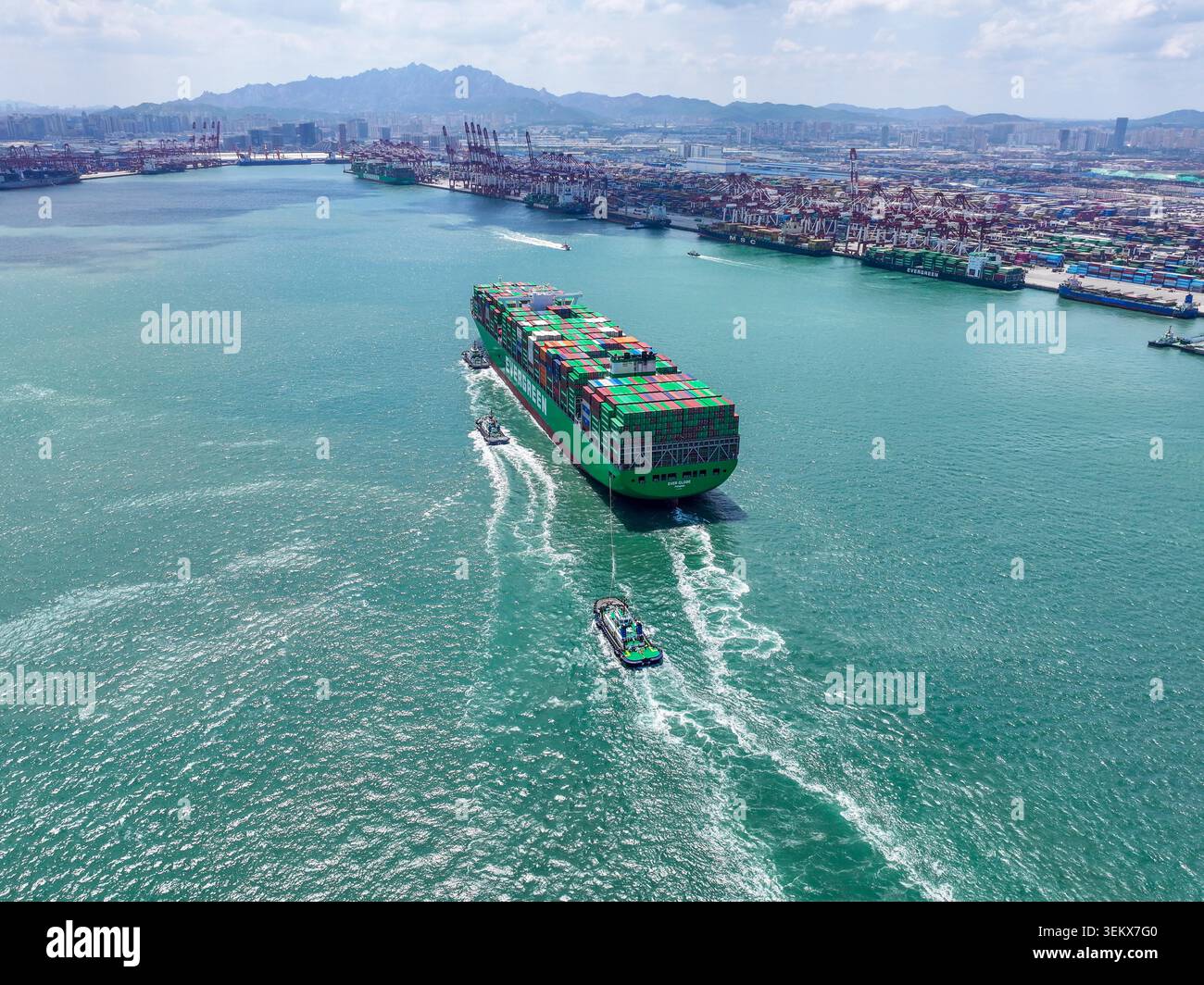 Large container ships loaded with foreign trade goods arrive at or ...
