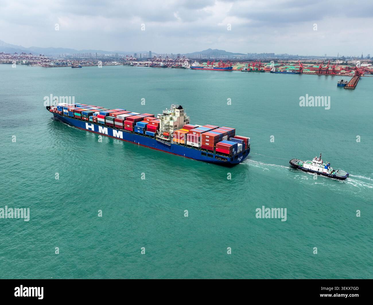 Large container ships loaded with foreign trade goods arrive at or ...