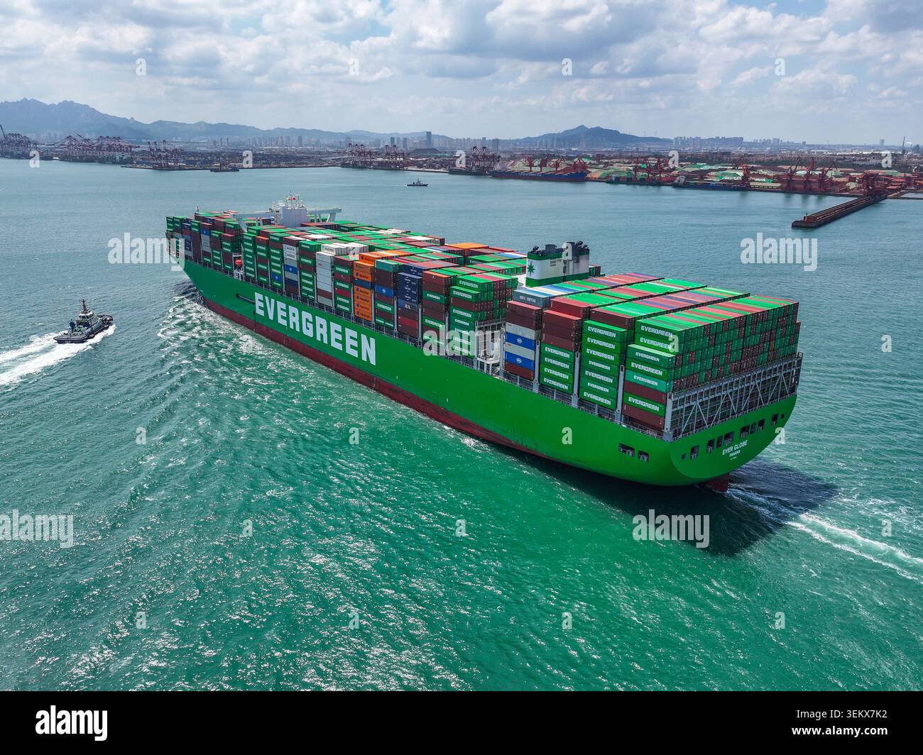 Large container ships loaded with foreign trade goods arrive at or ...