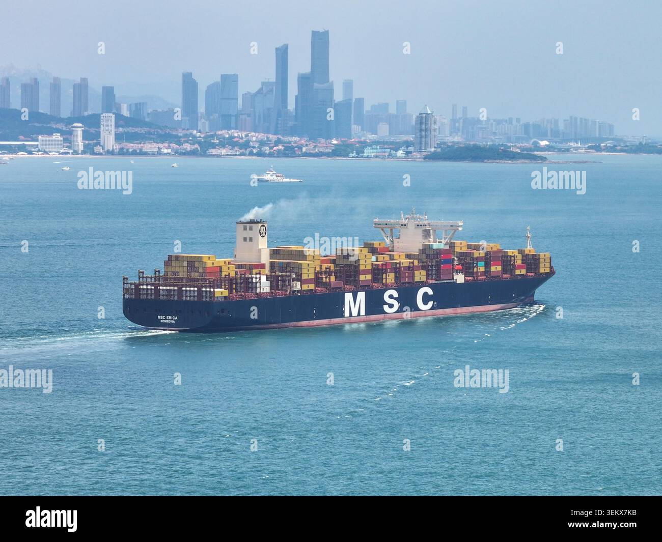 Large container ships loaded with foreign trade goods arrive at or ...