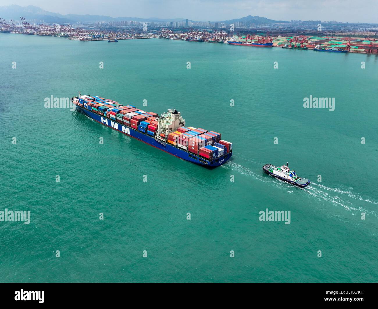 Large container ships loaded with foreign trade goods arrive at or ...