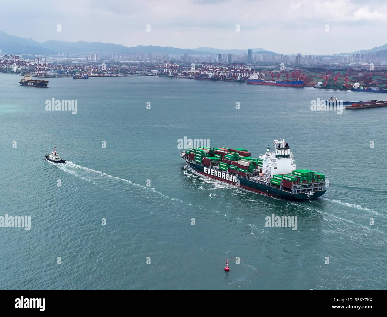 Large container ships loaded with foreign trade goods arrive at or ...