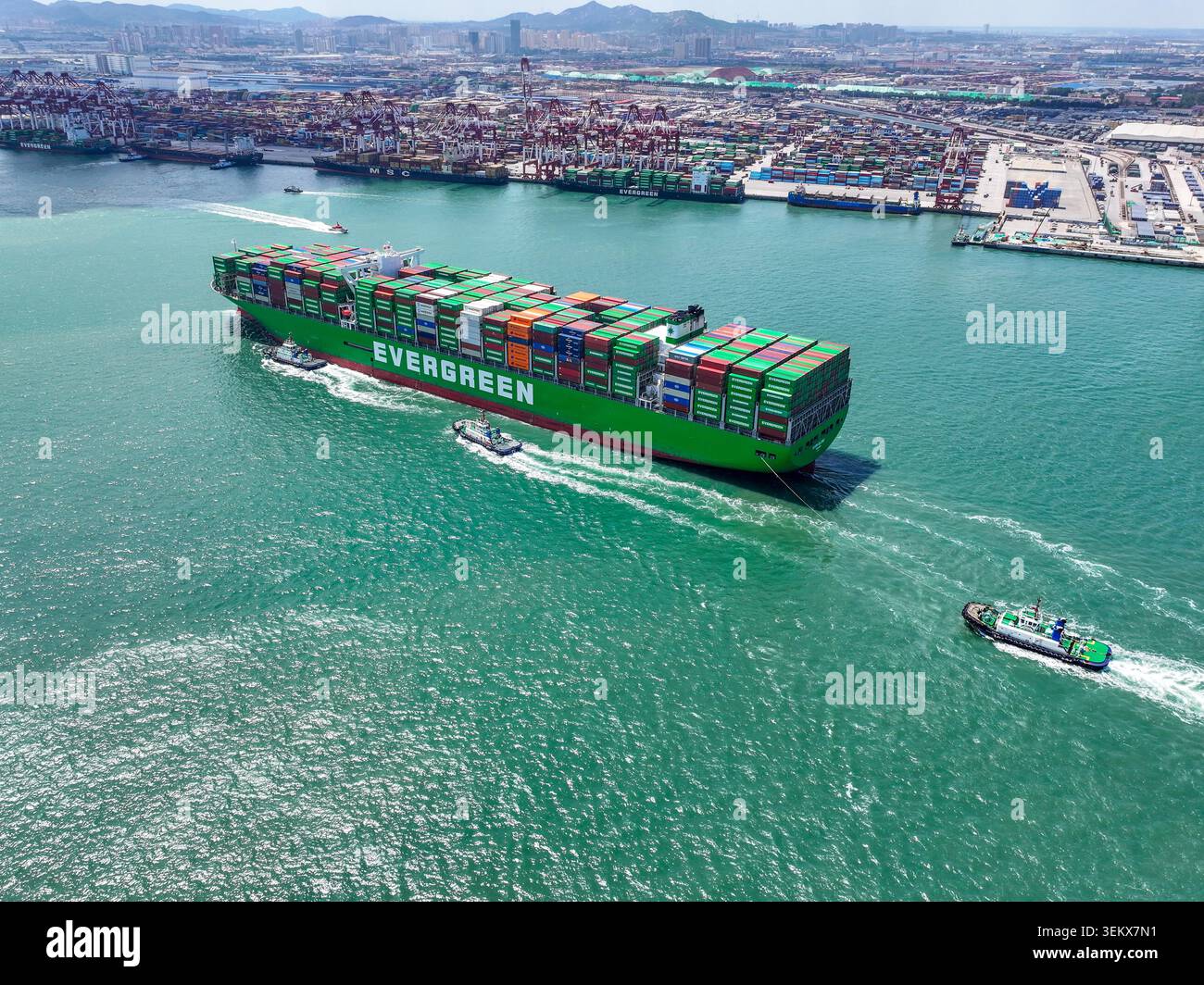 Large container ships loaded with foreign trade goods arrive at or ...