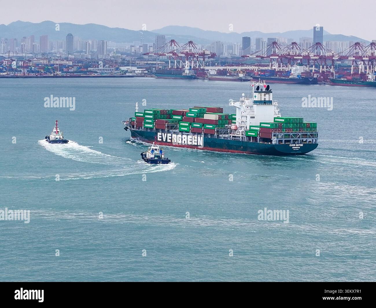 Large container ships loaded with foreign trade goods arrive at or ...