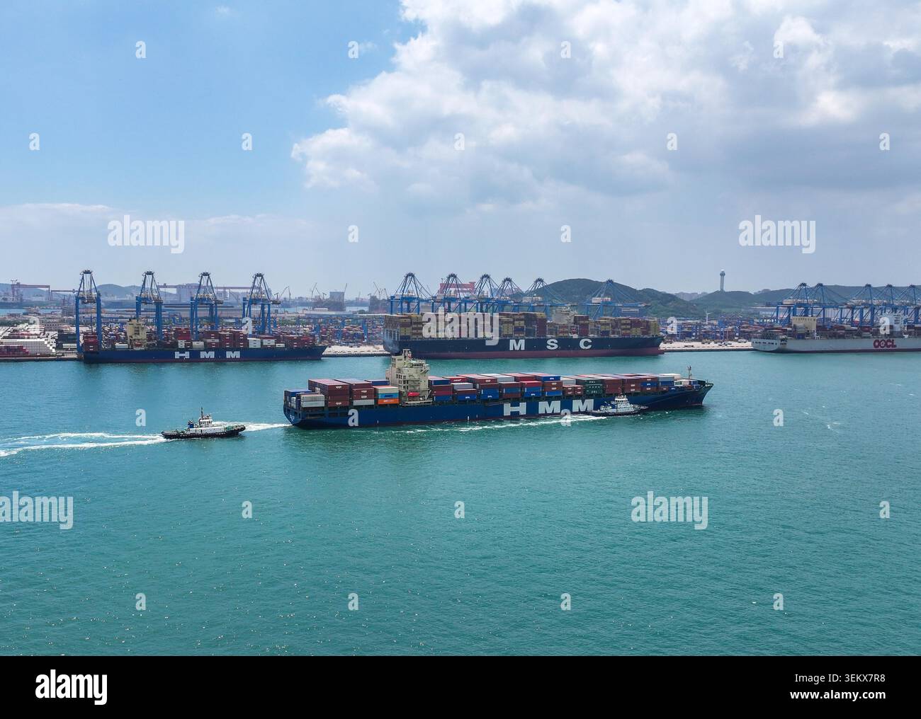 Large container ships loaded with foreign trade goods arrive at or ...