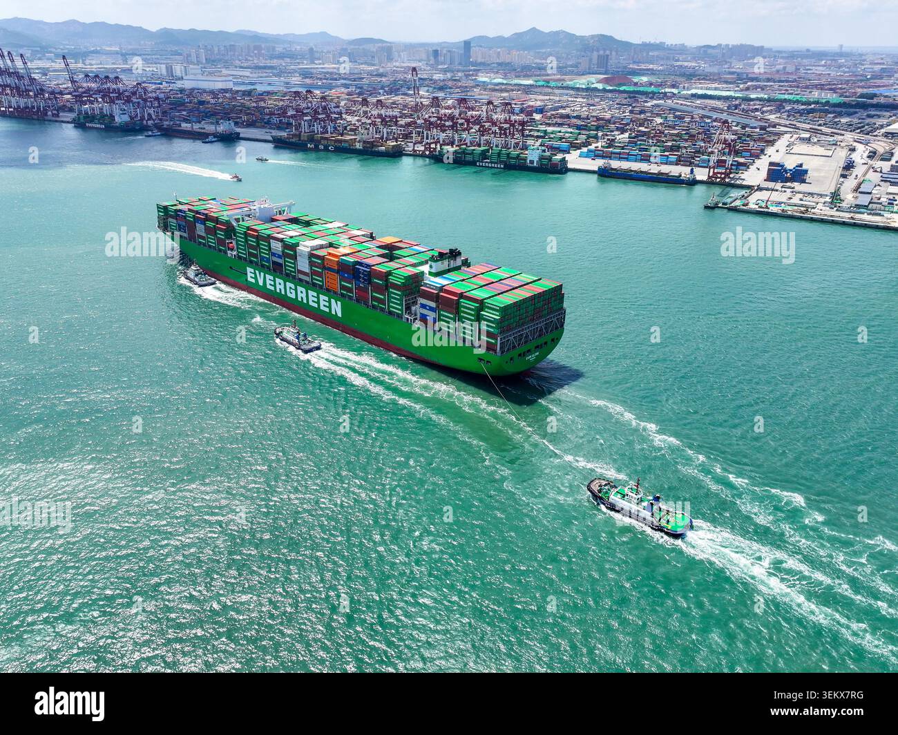 Large container ships loaded with foreign trade goods arrive at or ...