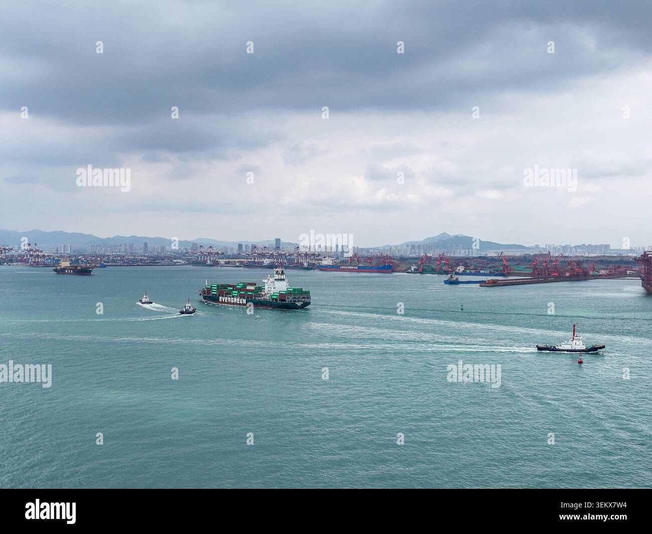 Large container ships loaded with foreign trade goods arrive at or ...