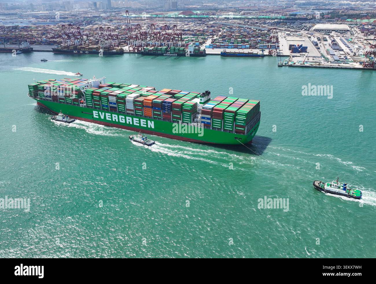 Large container ships loaded with foreign trade goods arrive at or ...
