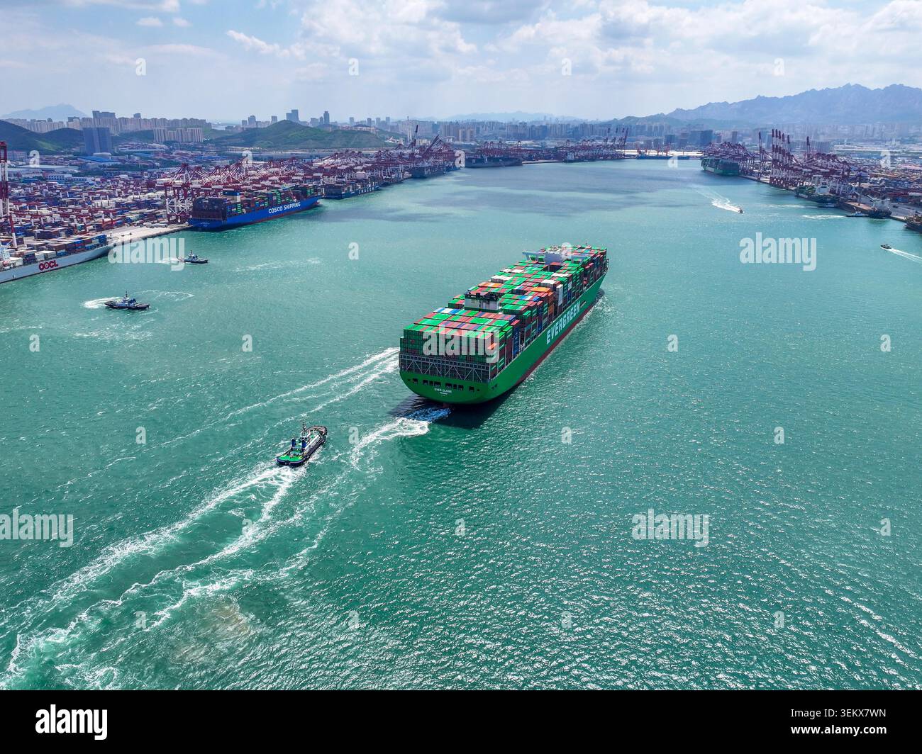 Large container ships loaded with foreign trade goods arrive at or ...