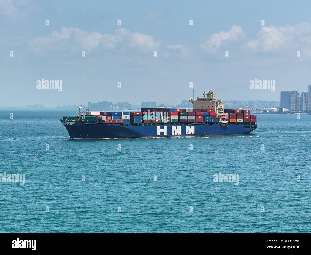 Large container ships loaded with foreign trade goods arrive at or ...