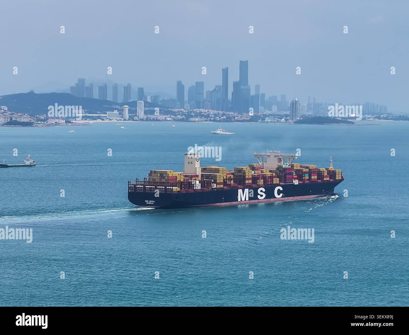 Large container ships loaded with foreign trade goods arrive at or ...