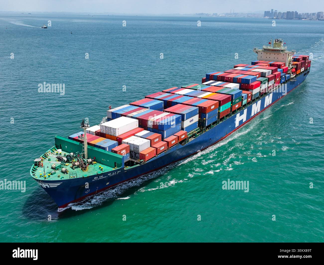 Large container ships loaded with foreign trade goods arrive at or ...