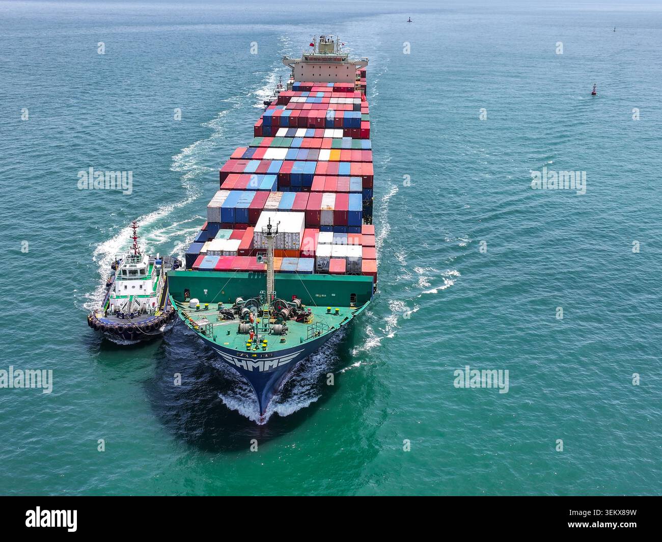 Large container ships loaded with foreign trade goods arrive at or ...
