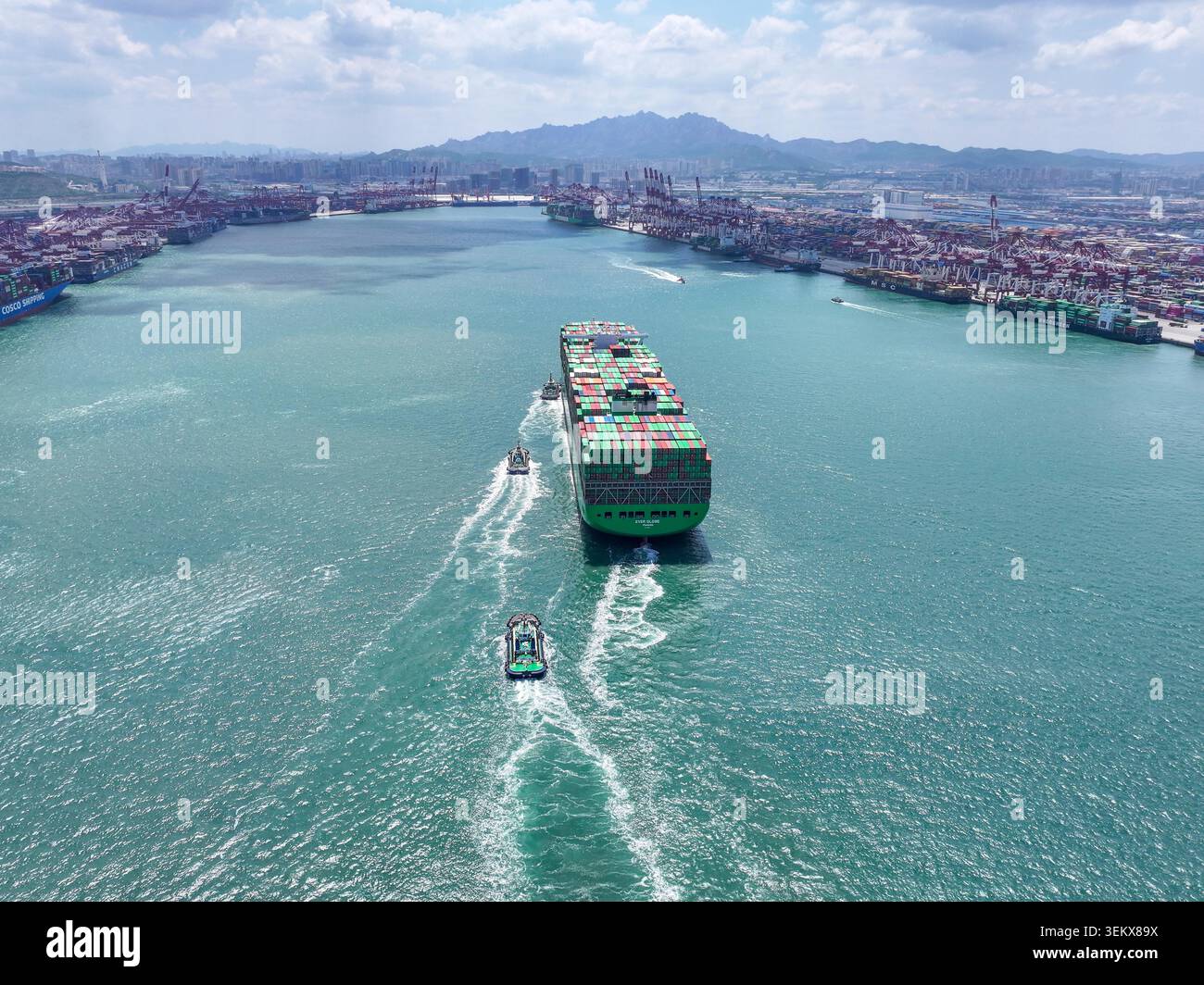 Large container ships loaded with foreign trade goods arrive at or ...