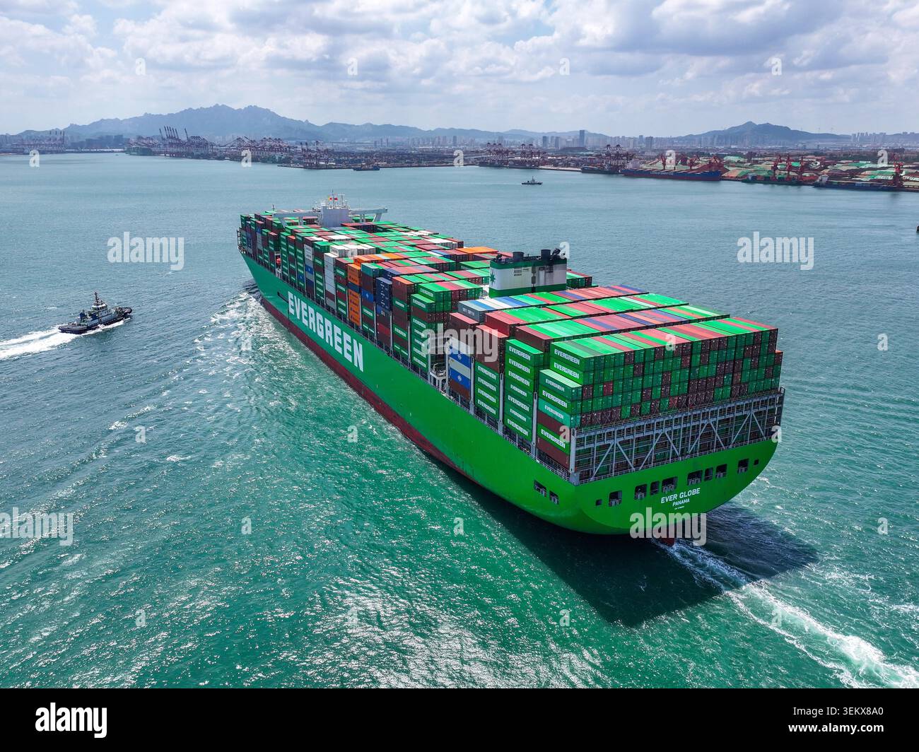 Large container ships loaded with foreign trade goods arrive at or ...