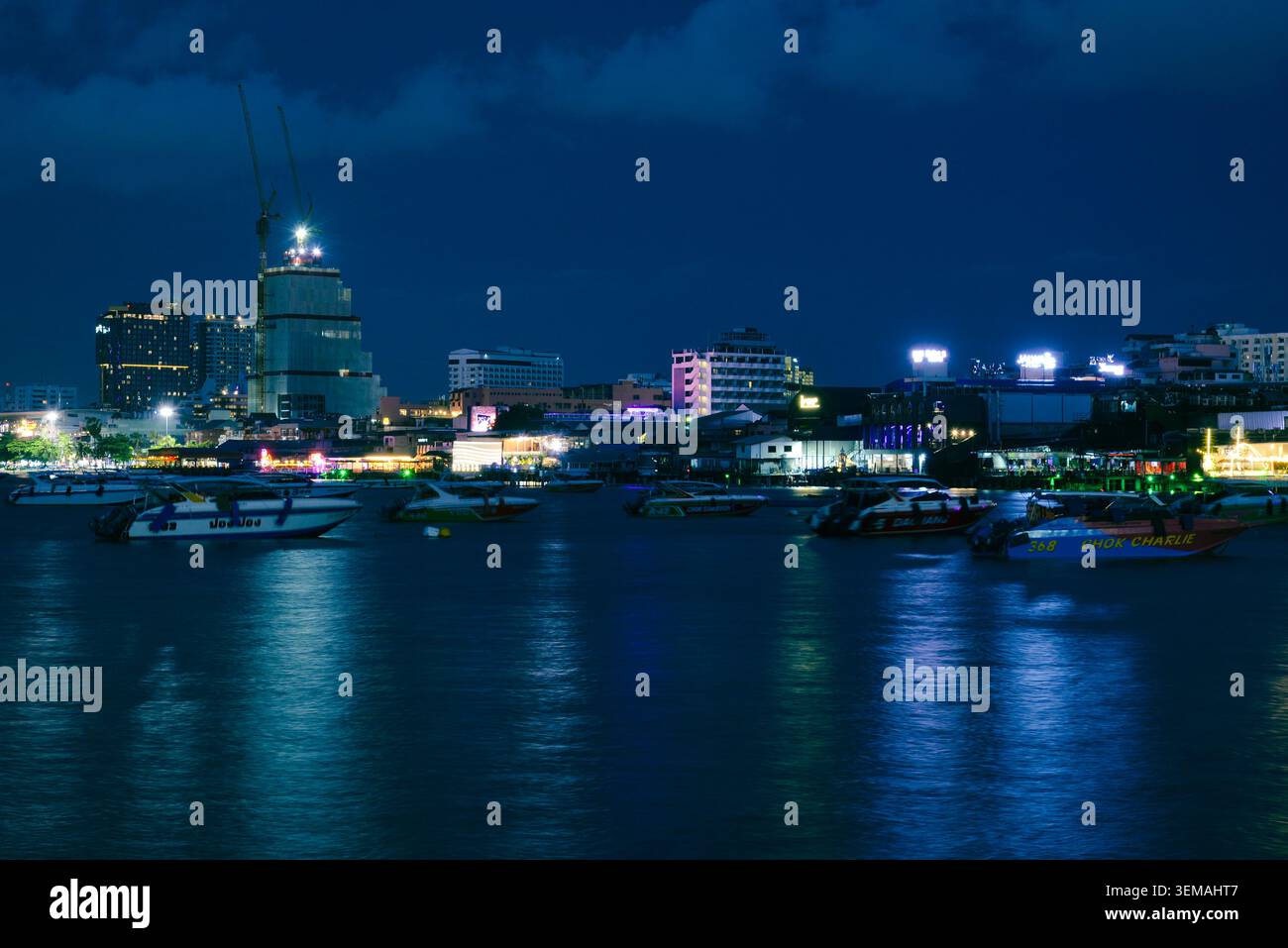 Pattaya, Thailand – June 1, 2026: Evening waterfront scene with boats ...